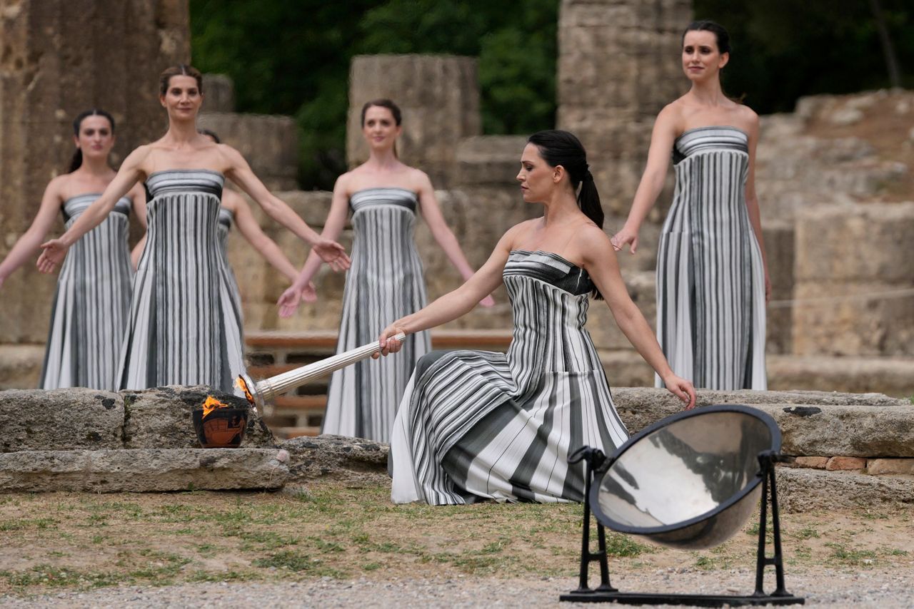 Despite weather glitch, the Paris Olympics flame is lit at the Greek ...