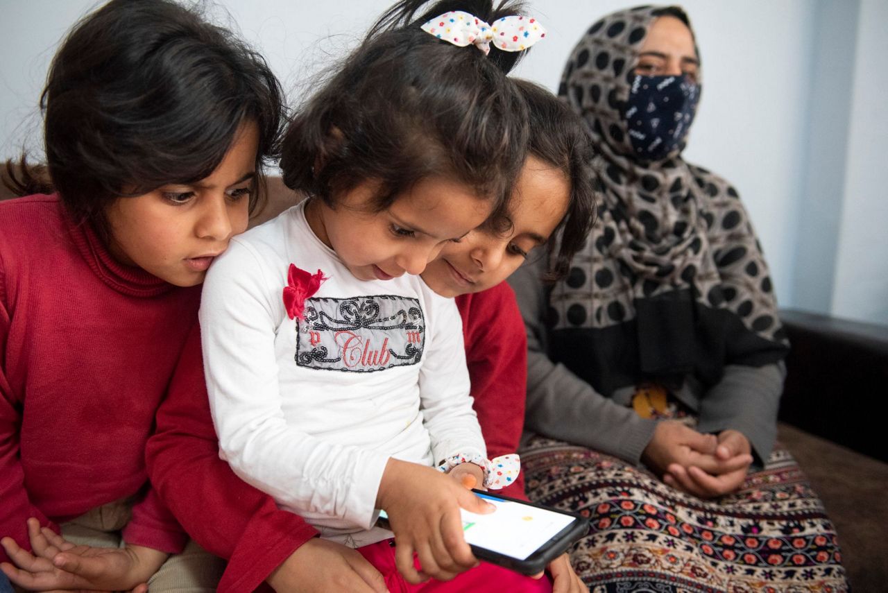 Syrian family reunited, against the odds, in Greece