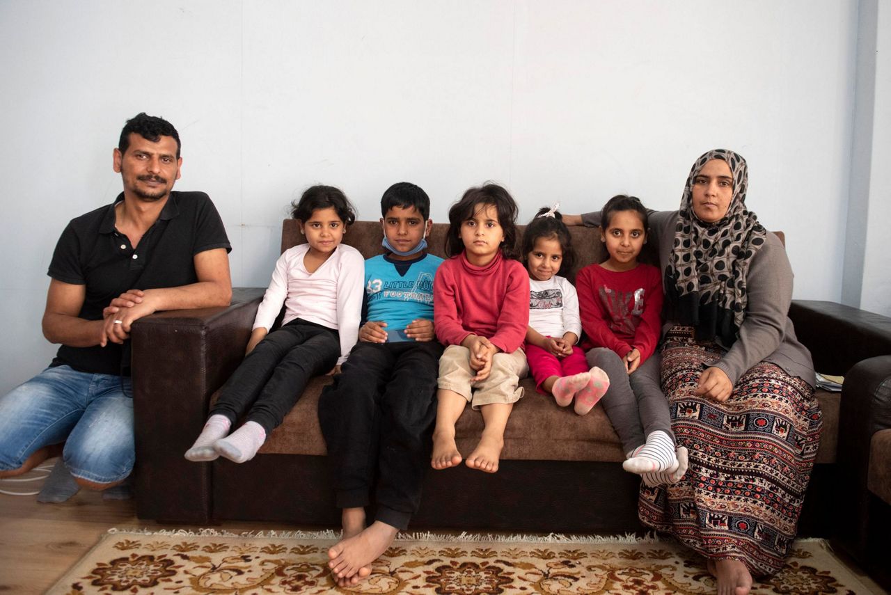 Syrian family reunited, against the odds, in Greece