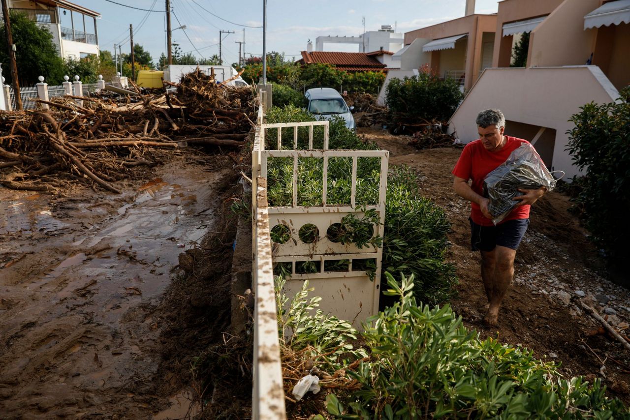 The Latest: Greece floods kill 2; hundreds of homes damaged