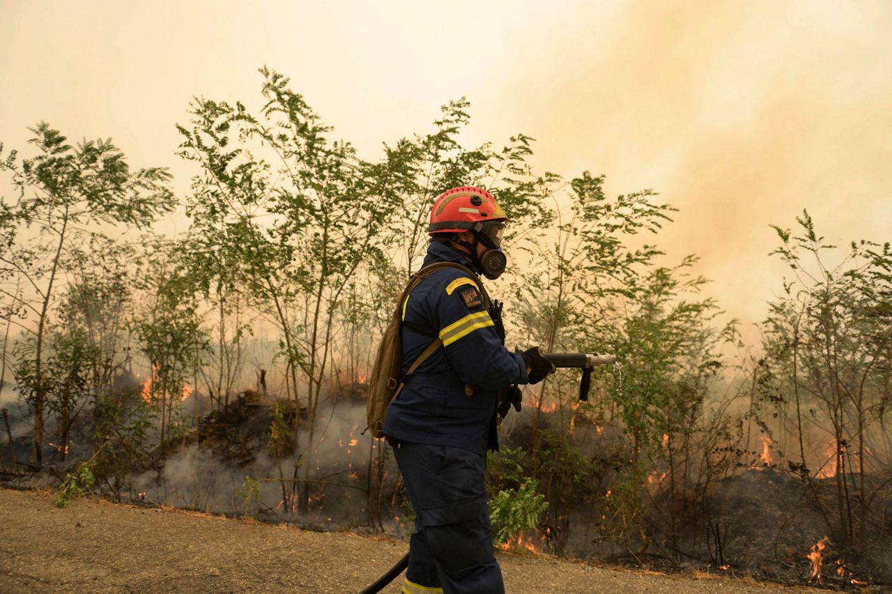 Greece further reinforces firefighting forces in massive wildfire in ...