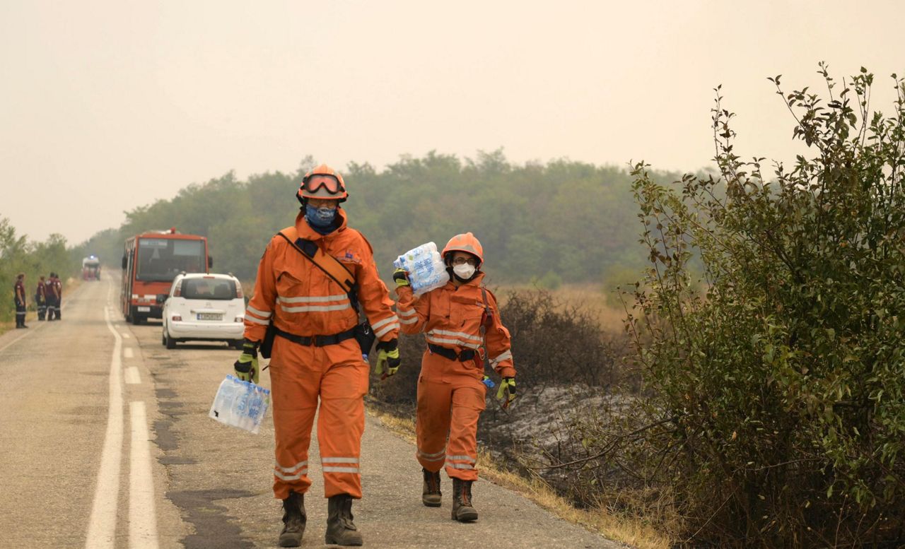 Greece further reinforces firefighting forces in massive wildfire in ...