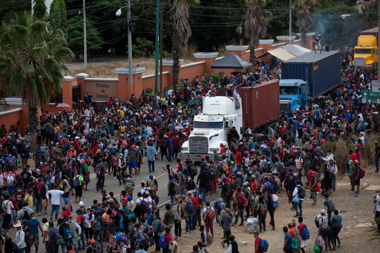 Weary migrants wait at Guatemala roadblock as caravan stalls