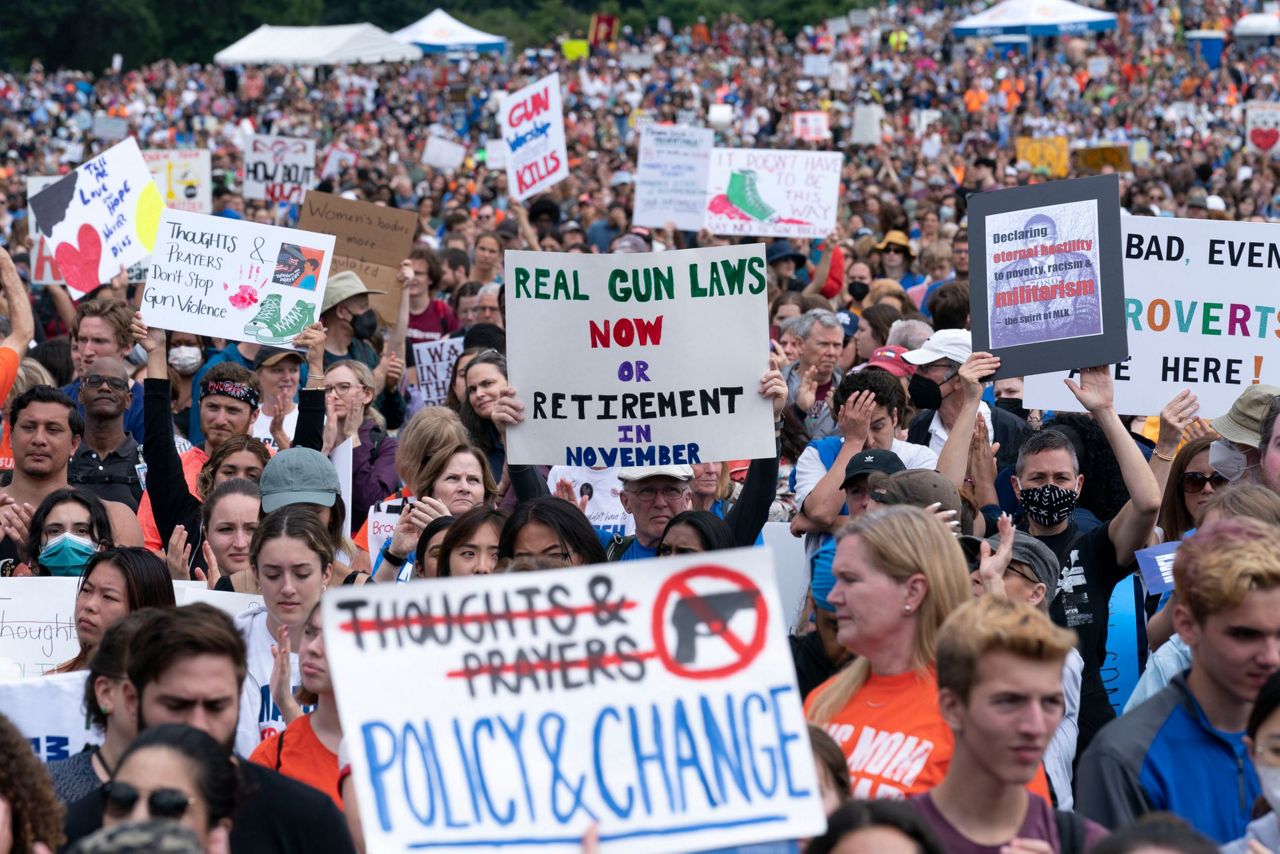Thousands rally for gun reform after surge in mass shootings