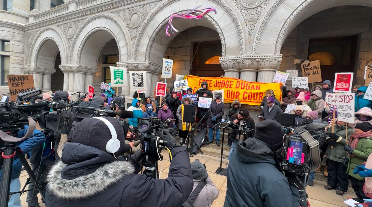 Protesters rally for Judge Hannah Dugan outside courthouse