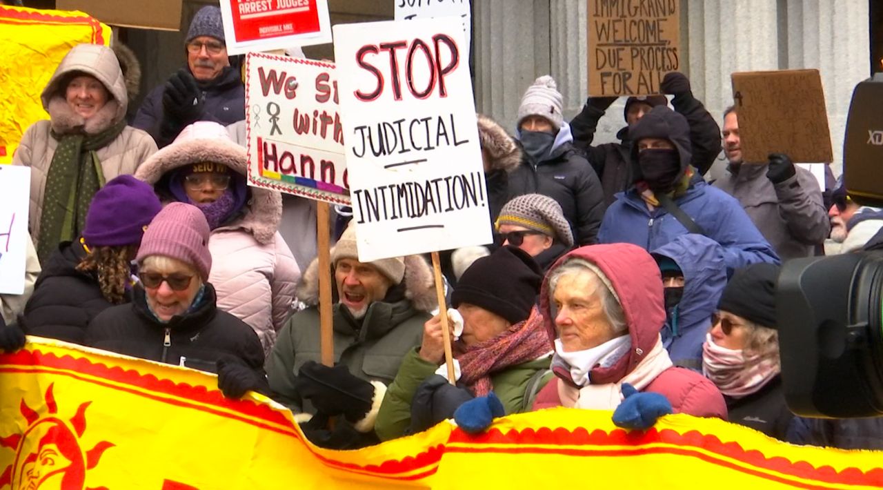 Protesters rally for Judge Hannah Dugan outside courthouse