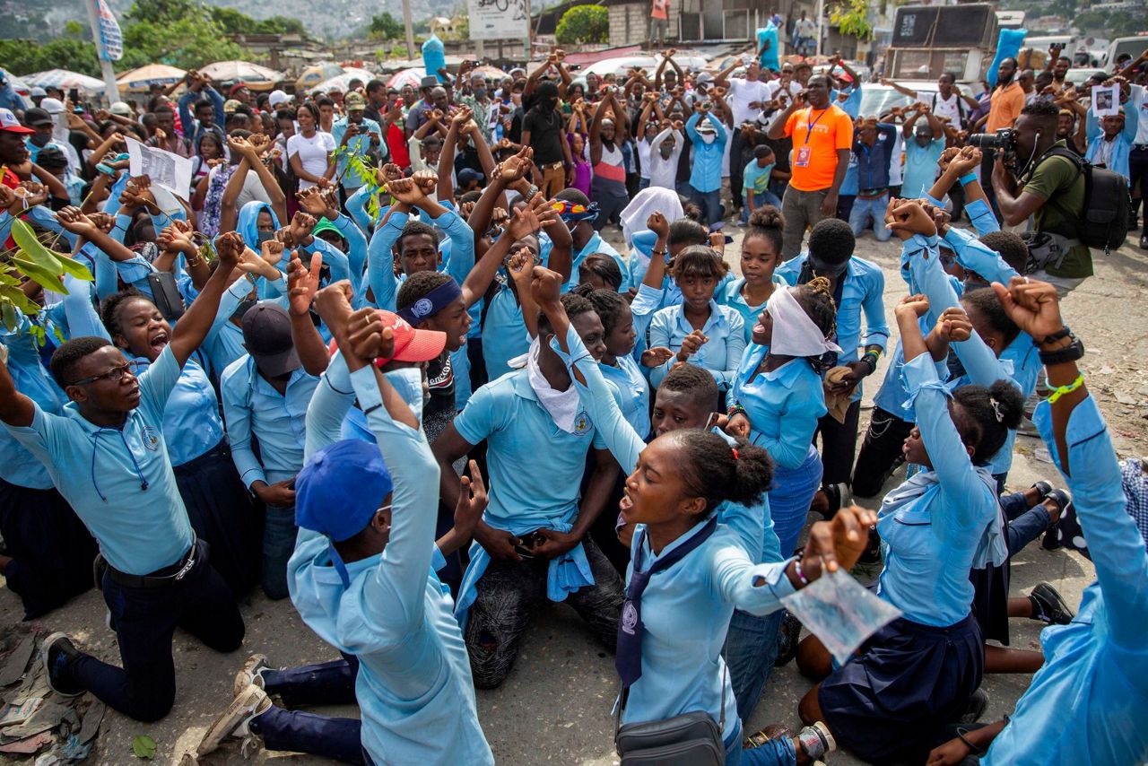 Hundreds march in Haiti after outrage over student's murder