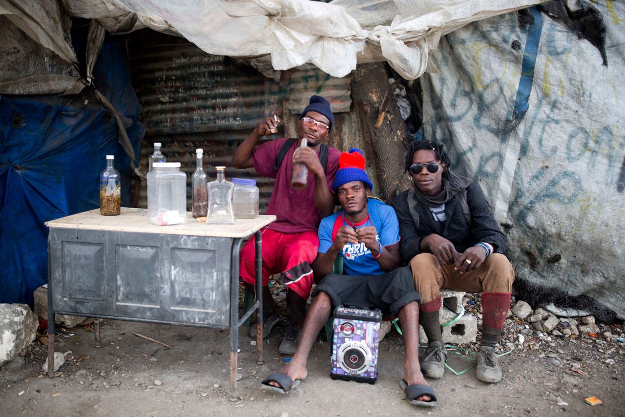 AP Photos: Haitians scour the country's largest trash dump