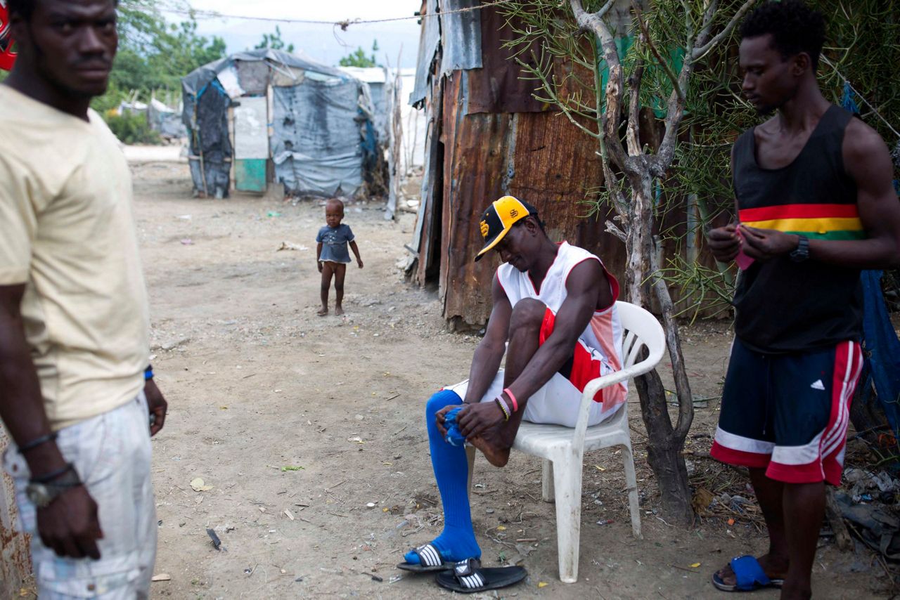 AP Photos: Haitians scour the country's largest trash dump
