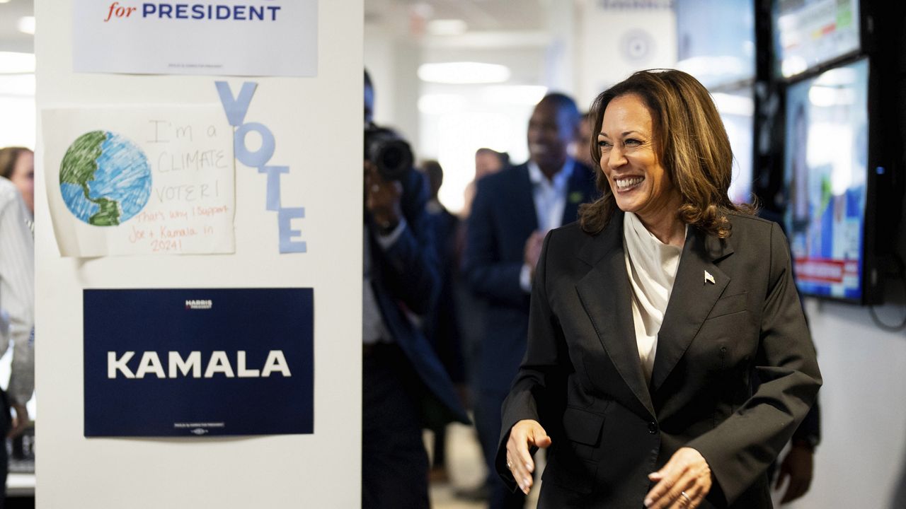 Harris rallies campaign team as Biden pledges full support
