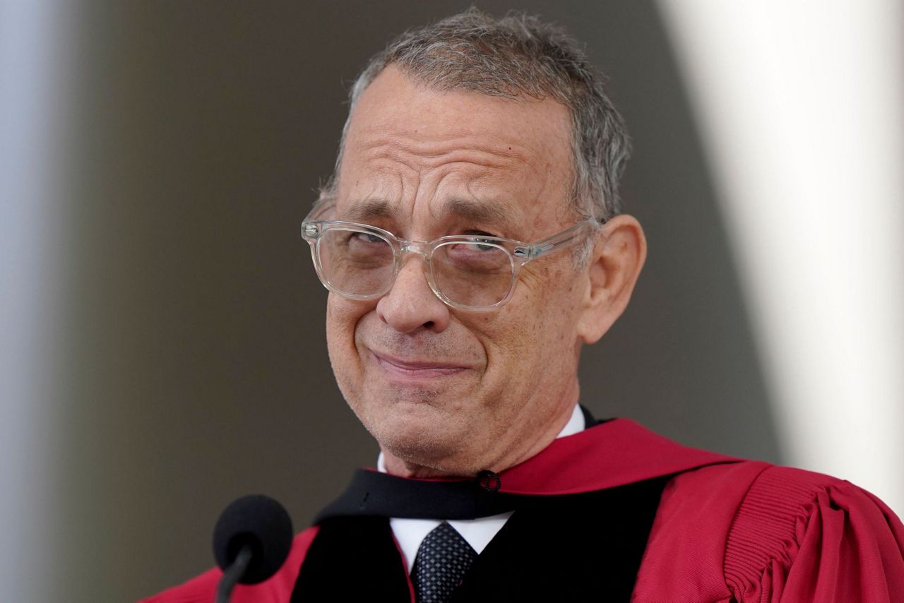 Tom Hanks urges Harvard grads to defend the truth and resist indifference