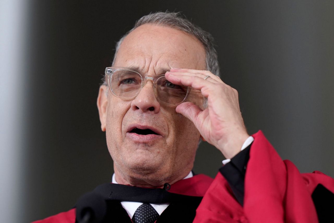Tom Hanks urges Harvard grads to defend the truth and resist indifference