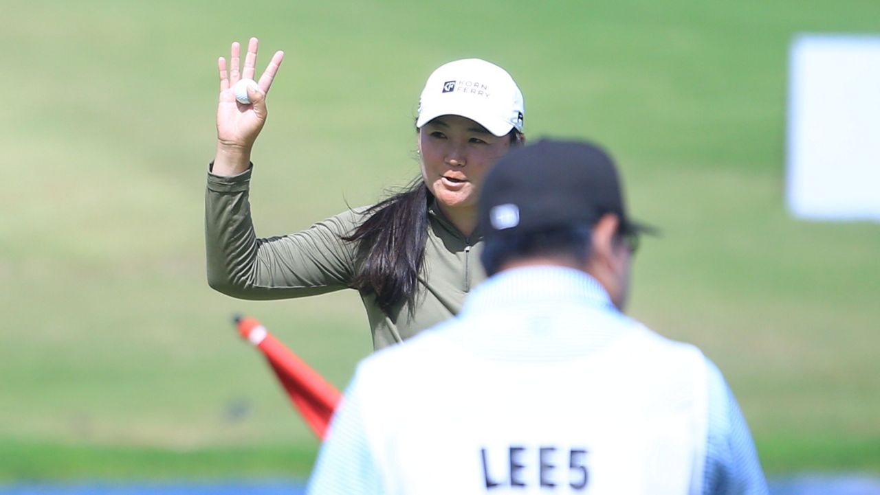 Hwang gets 1st career LPGA victory at Lotte Championship