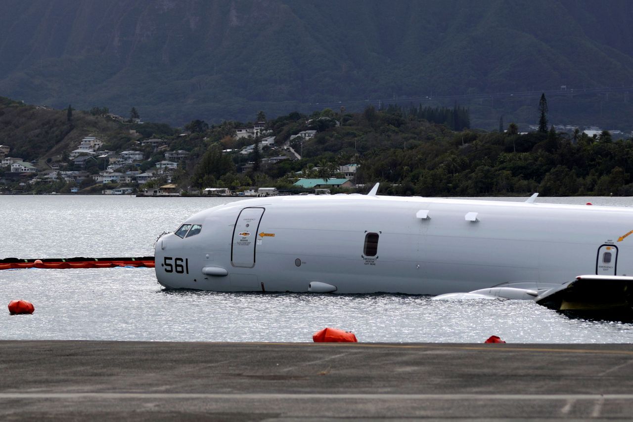 US Navy releases underwater footage of plane that overshot a runway ...