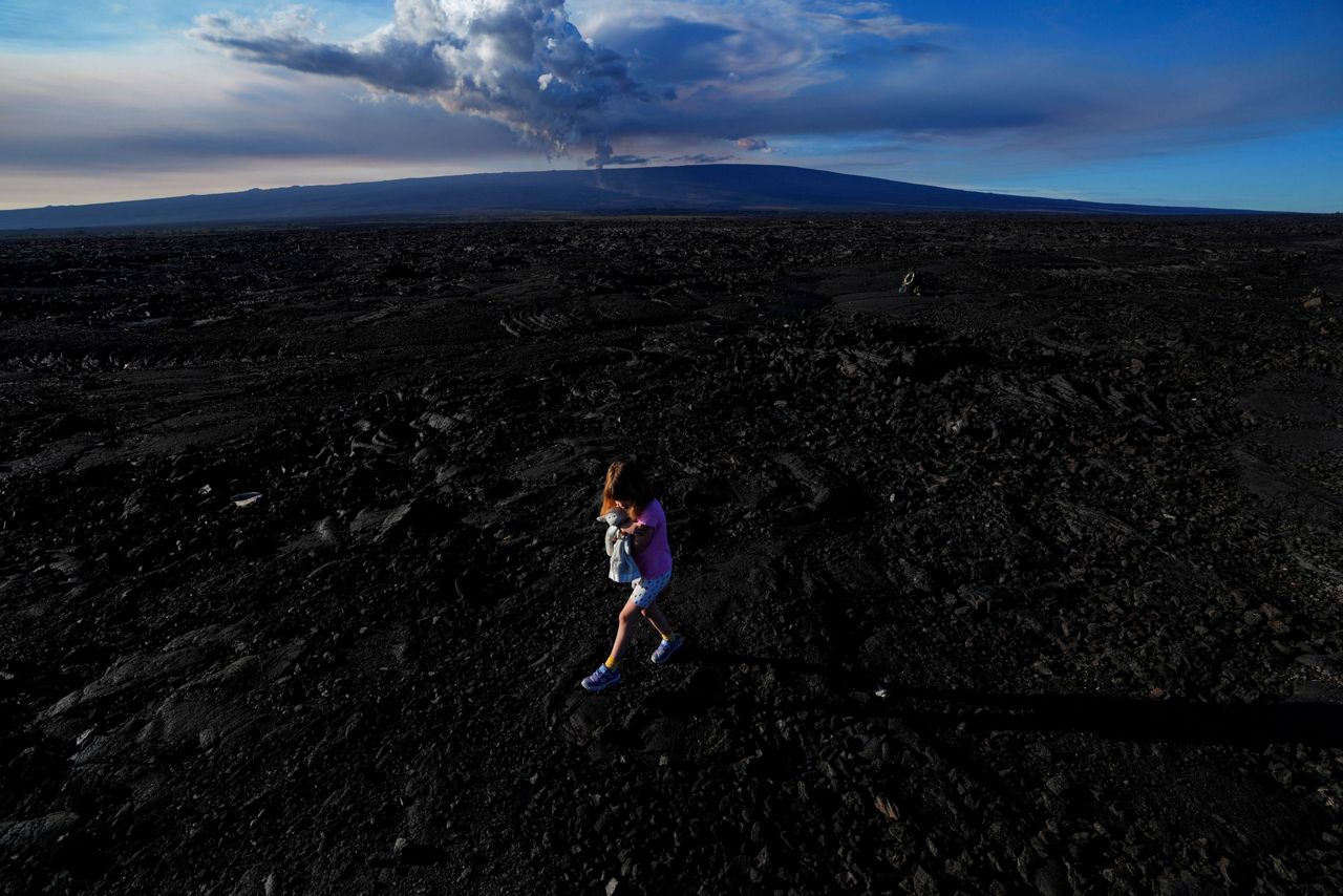 AP PHOTOS: Spectacular eruption of world's largest volcano