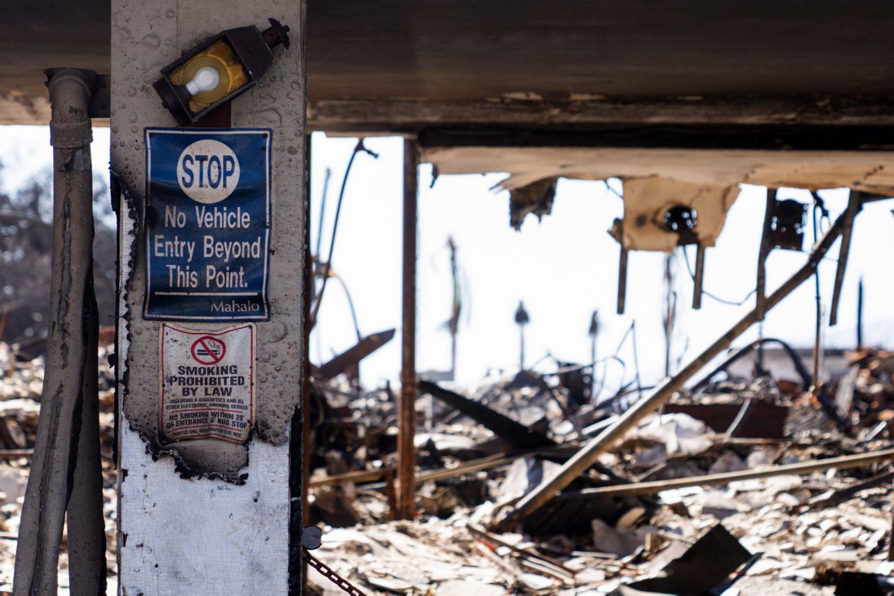 Heart of Hawaii's historic Lahaina, burned in wildfire, reopens to ...