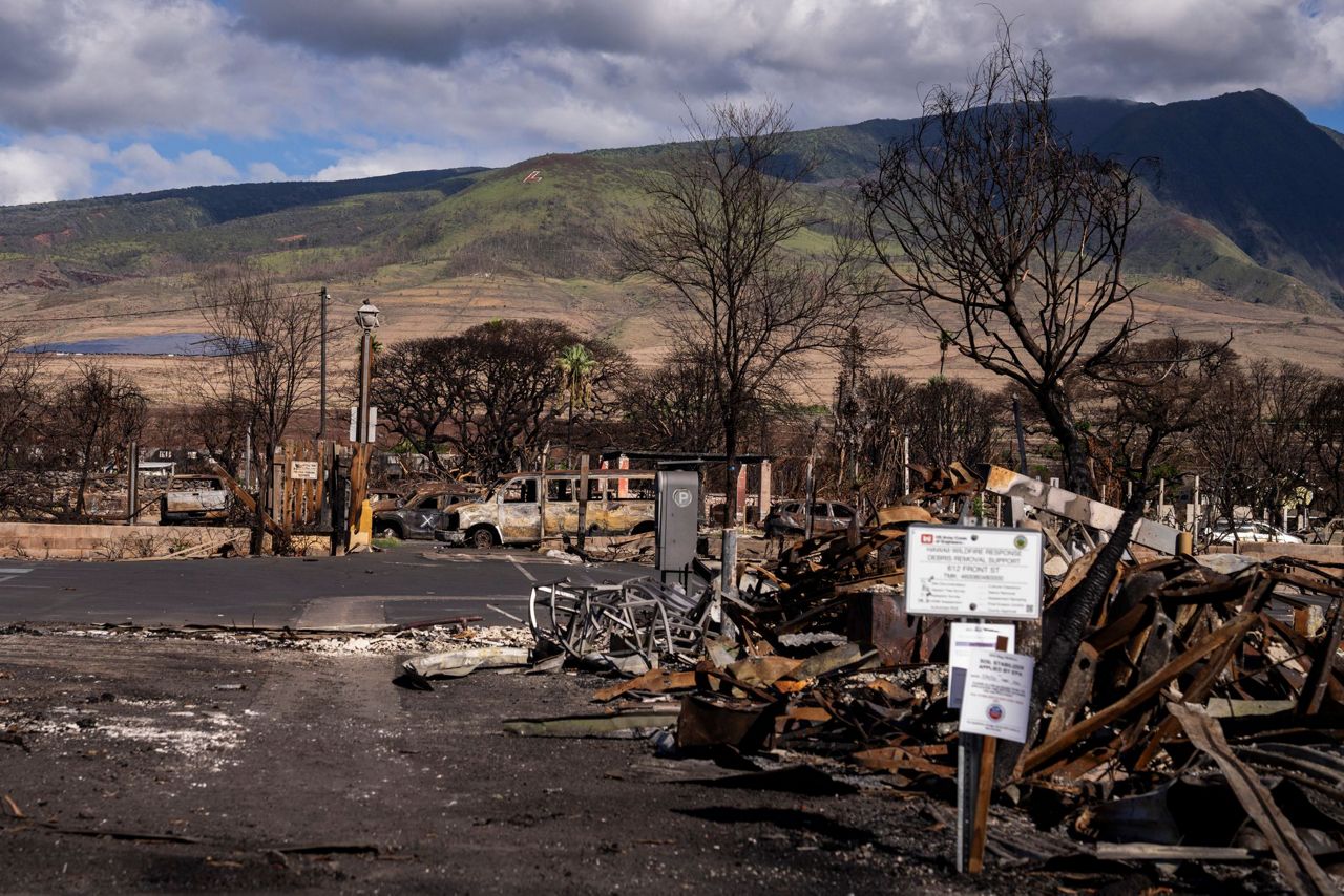 Heart of Hawaii's historic Lahaina, burned in wildfire, reopens to ...