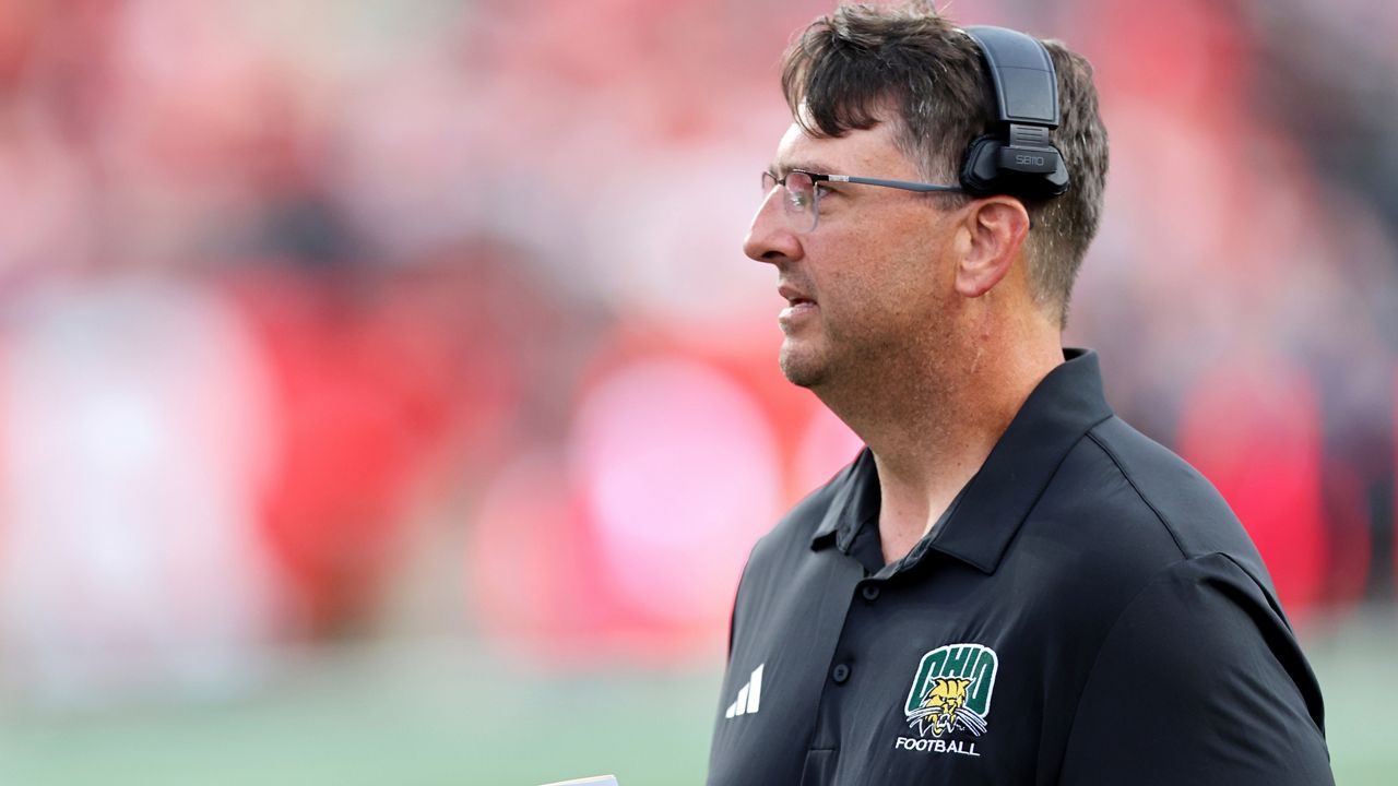 Former UH player, coach Brian Smith fired for cause at Ohio