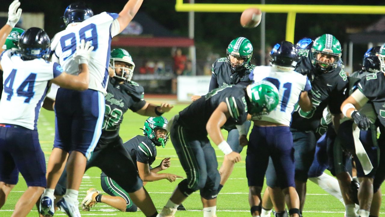 Kailua football clutch against Kapaa for 1st state title