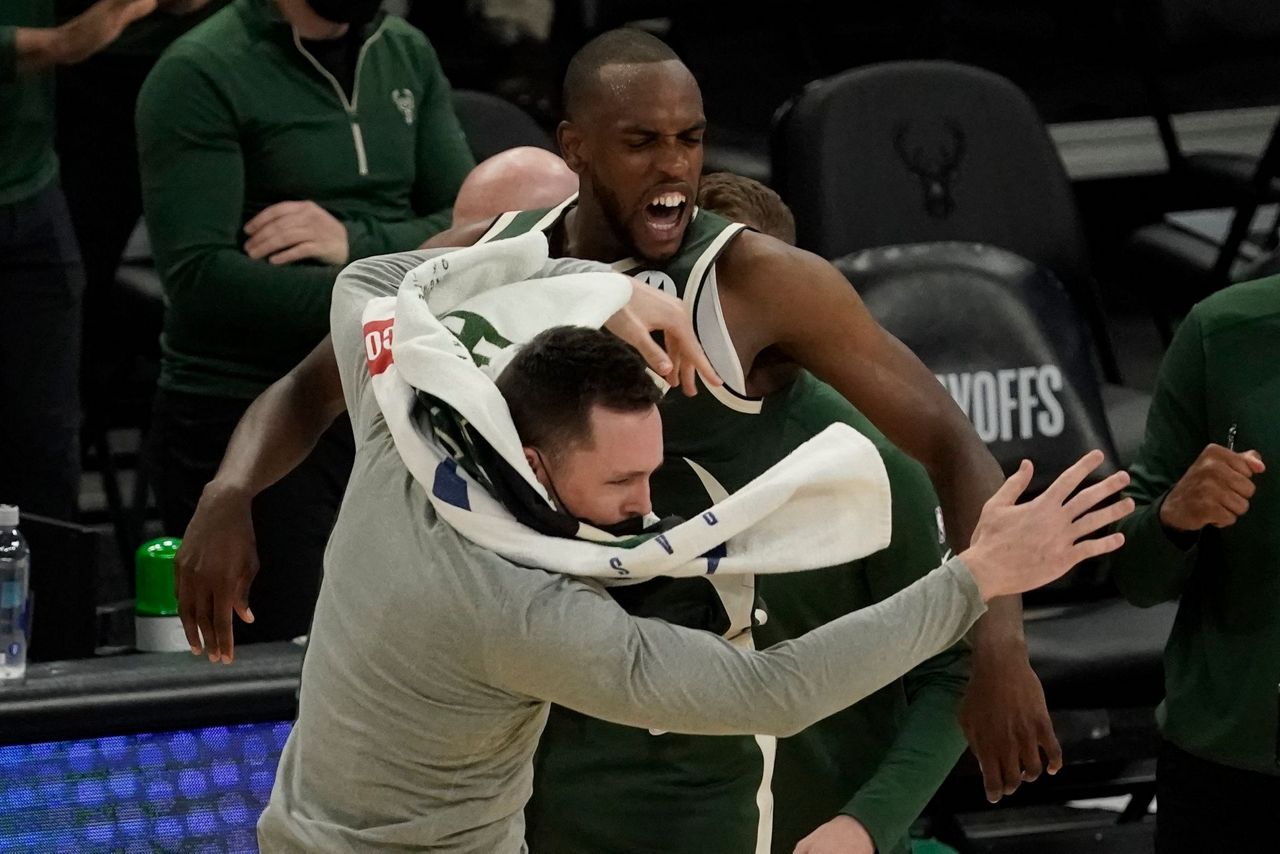 Khris Middleton lifts Bucks past Heat in OT in Game 1