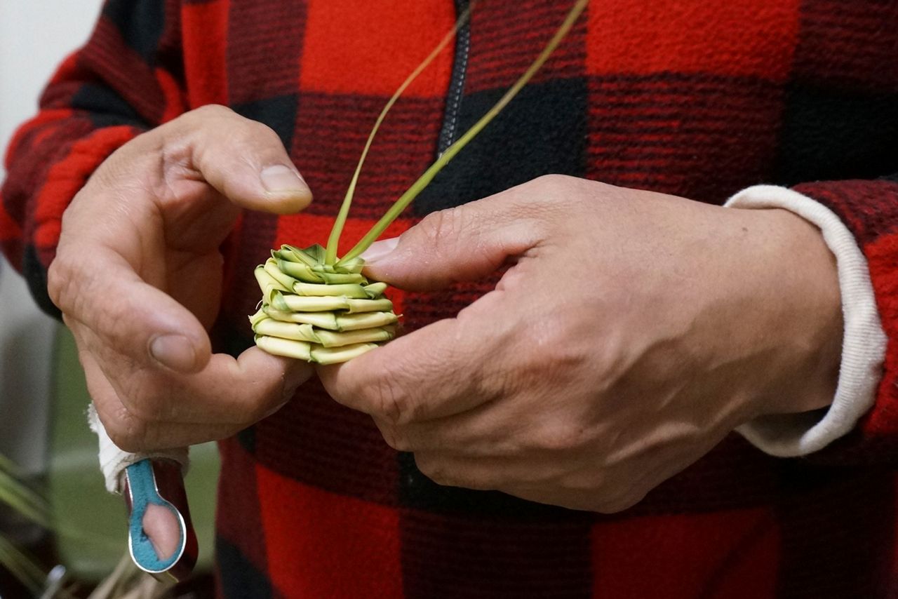 Palm weaving workshops join faith, culture for Palm Sunday