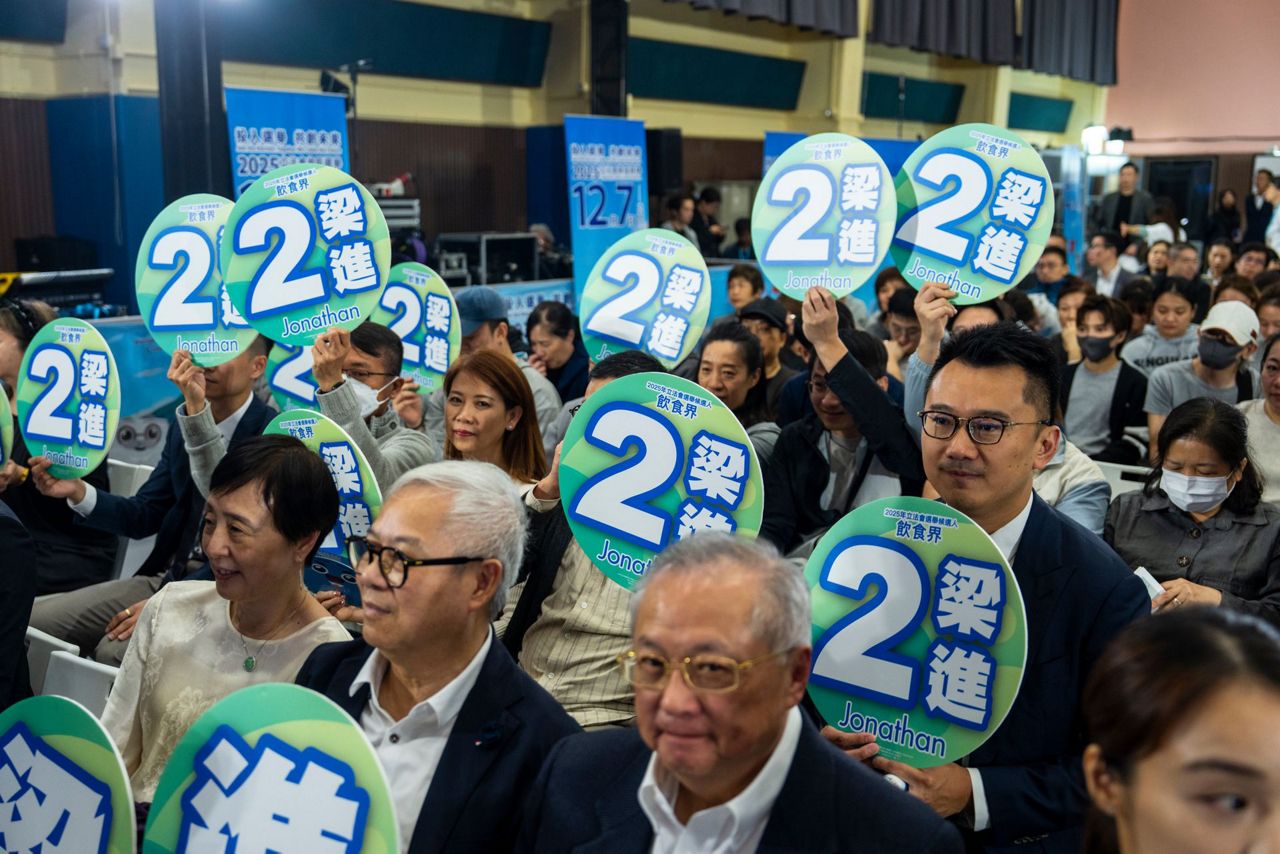 Hong Kong holds a legislative election Sunday after a fire raised ...