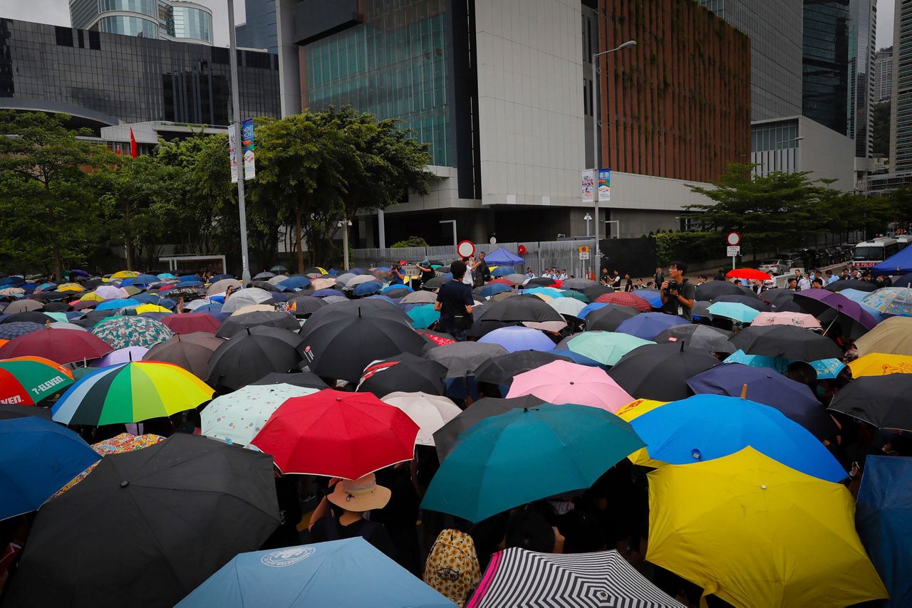Hong Kong police begin to clear streets of protesters