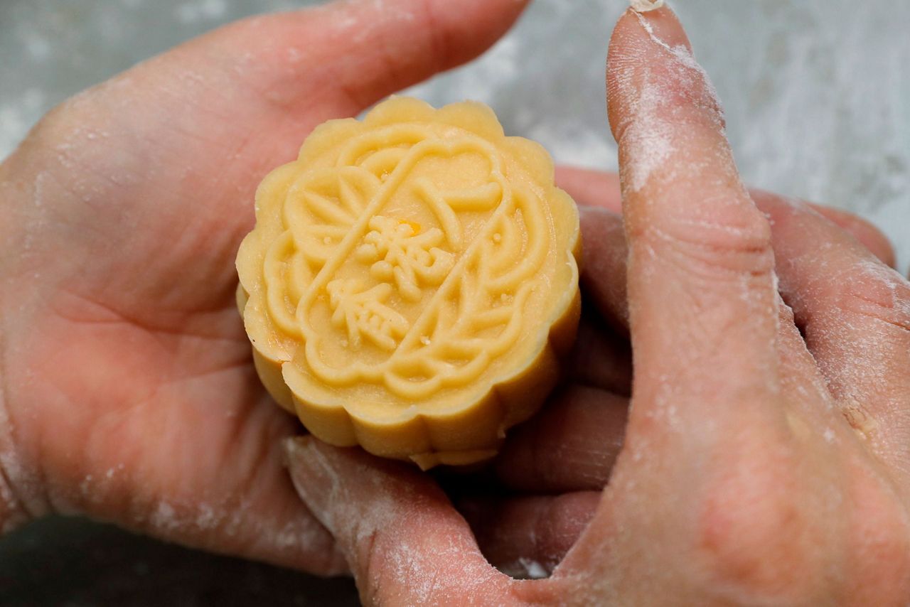 Hong Kong bakery's mooncakes carry protest movement slogans