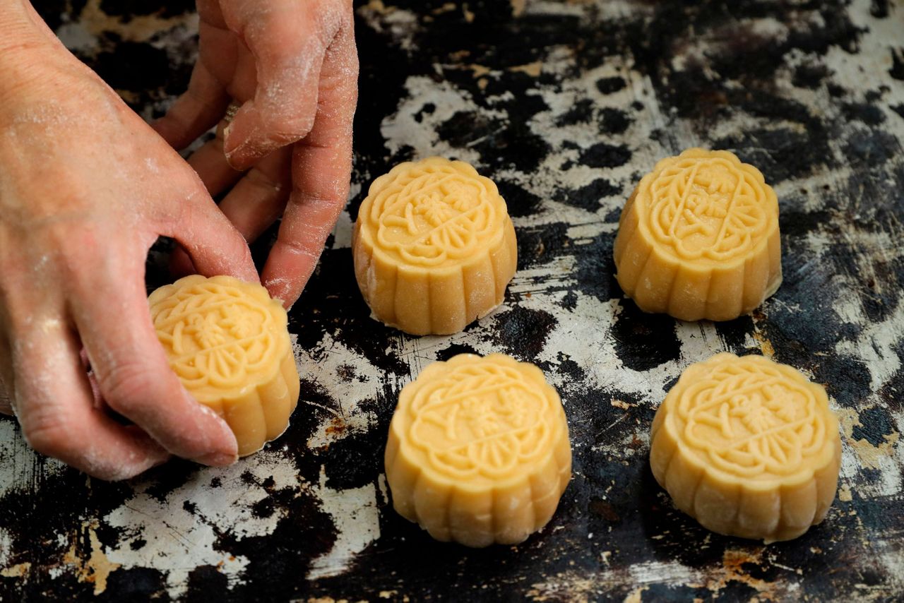 Hong Kong bakery's mooncakes carry protest movement slogans
