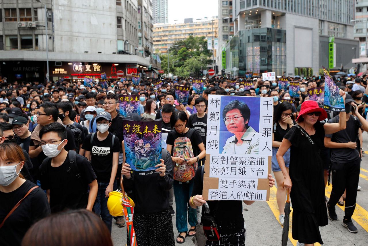Hong Kong police say protests off designated route illegal