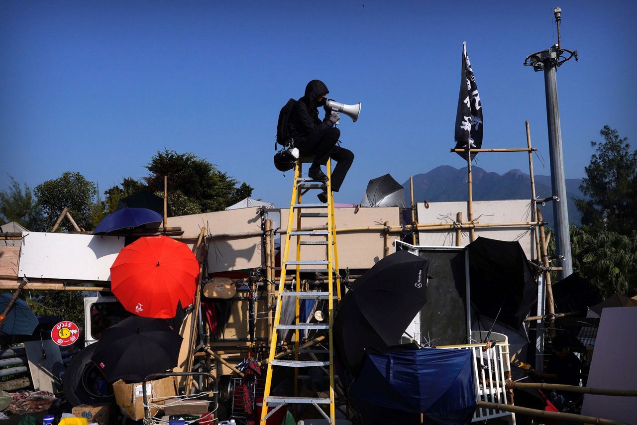 Holed up in university, Hong Kong protesters issue demands