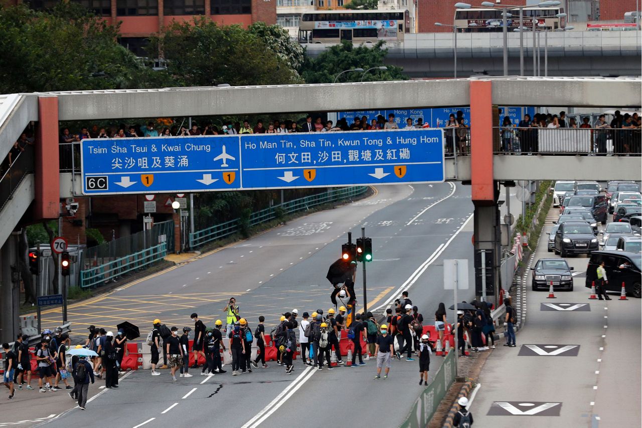 Hong Kong police say protests off designated route illegal