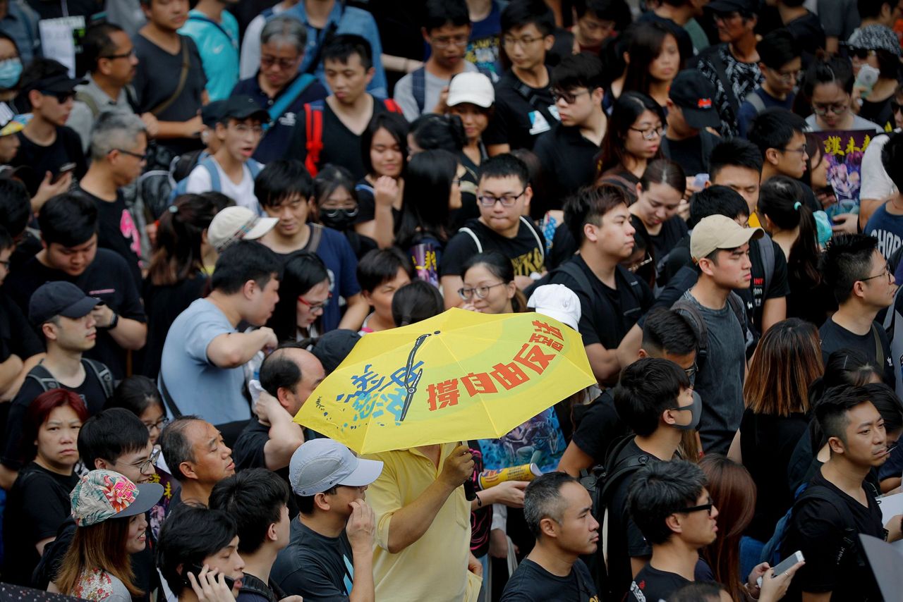 Hong Kong police arrest over 20 protesters in new scuffles