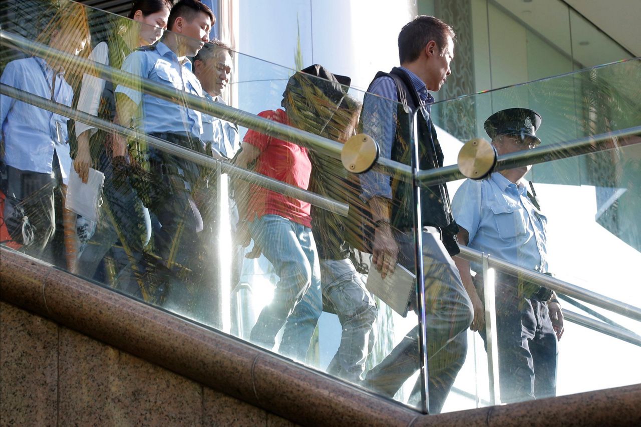 Report: 4 injured in rare shooting in Hong Kong