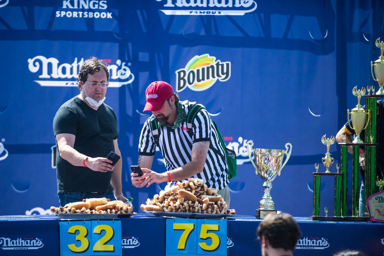 Joey Chestnut sets new record at post-pandemic hot dog race