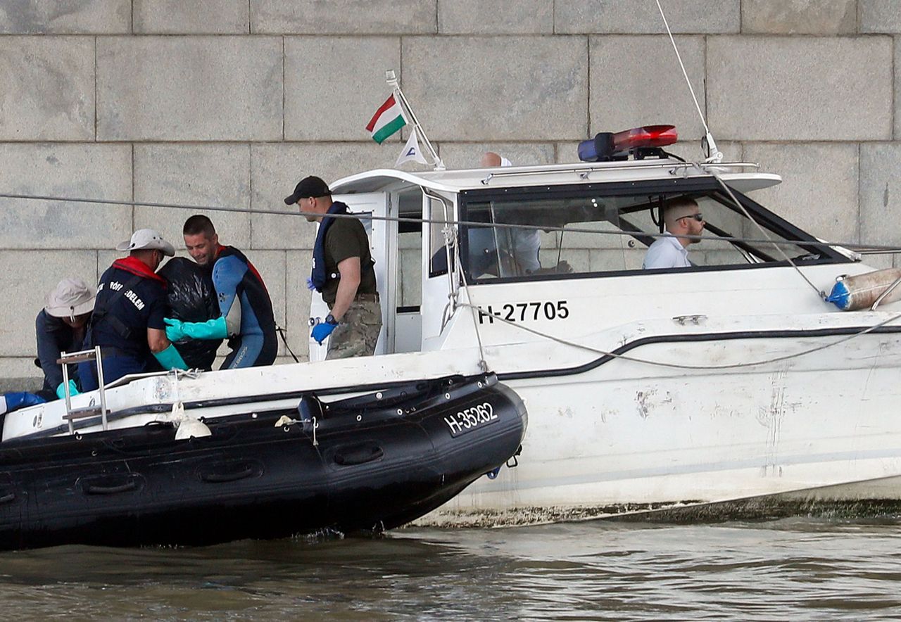The Latest: Body of 13th victim recovered from sunken boat