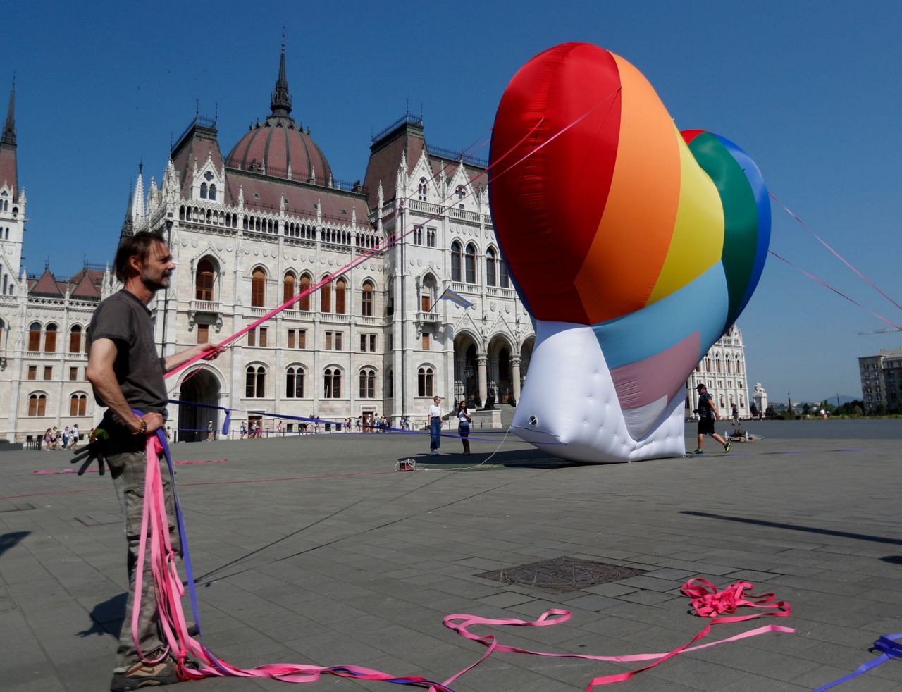Hungary activists vow to resist LGBT law, symbol of EU rift