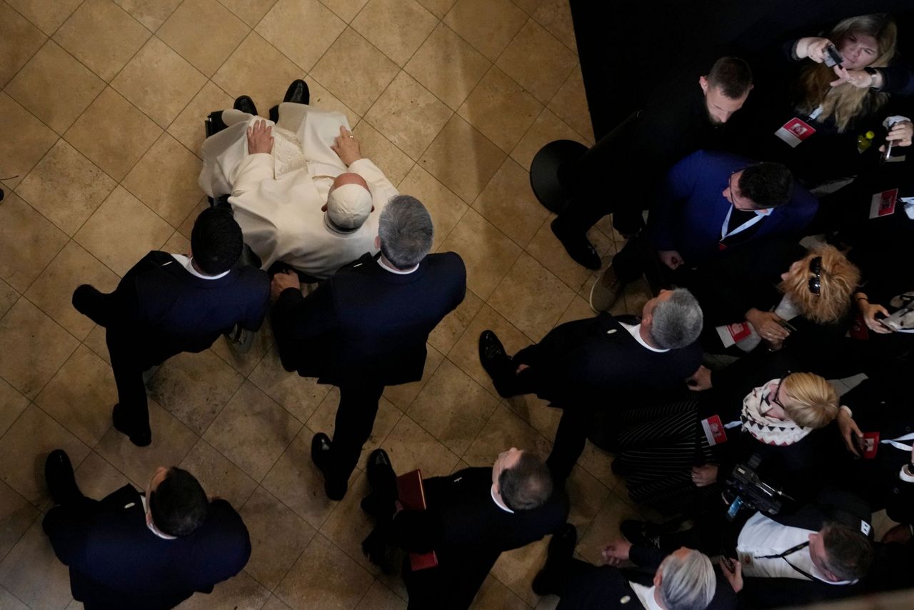 Pope visits refugees, urges Hungary to show charity to all