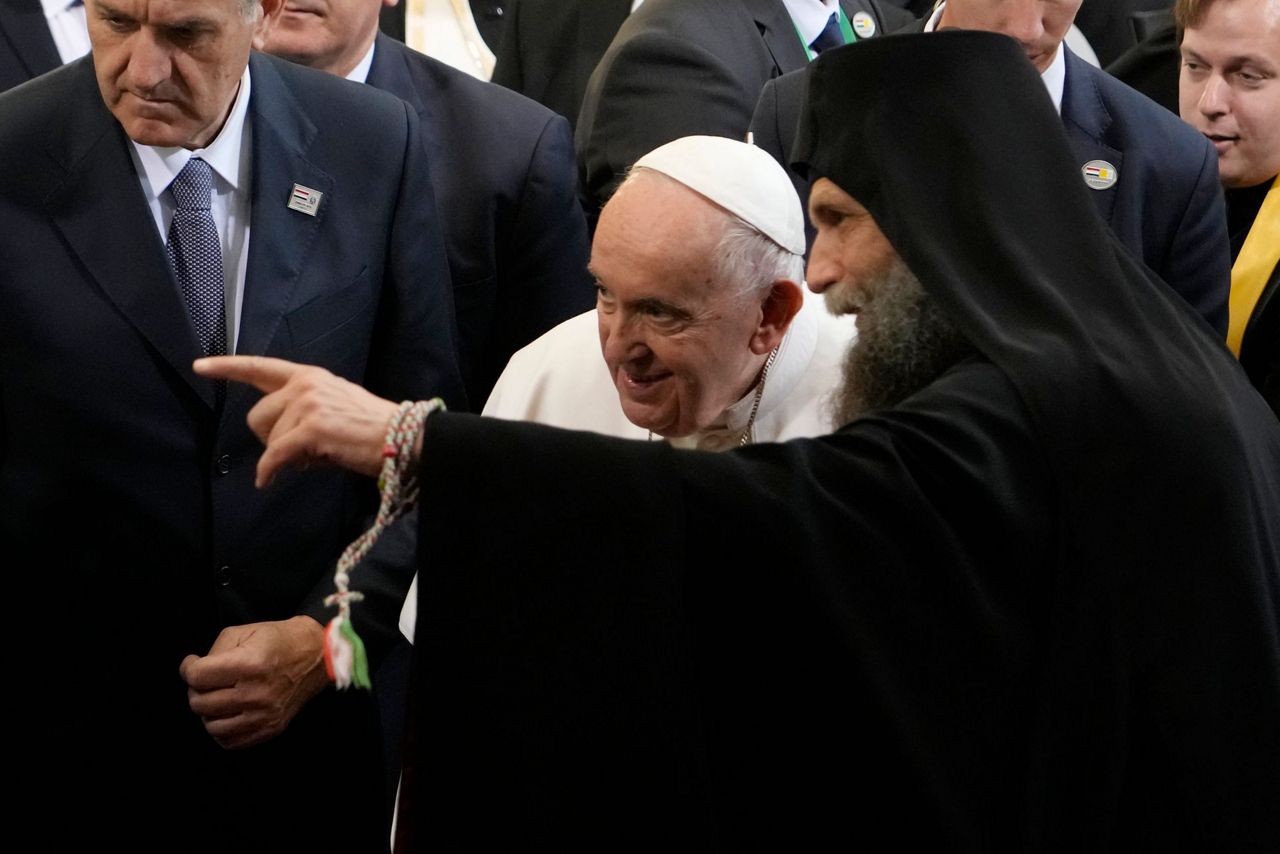 Pope visits refugees, urges Hungary to show charity to all
