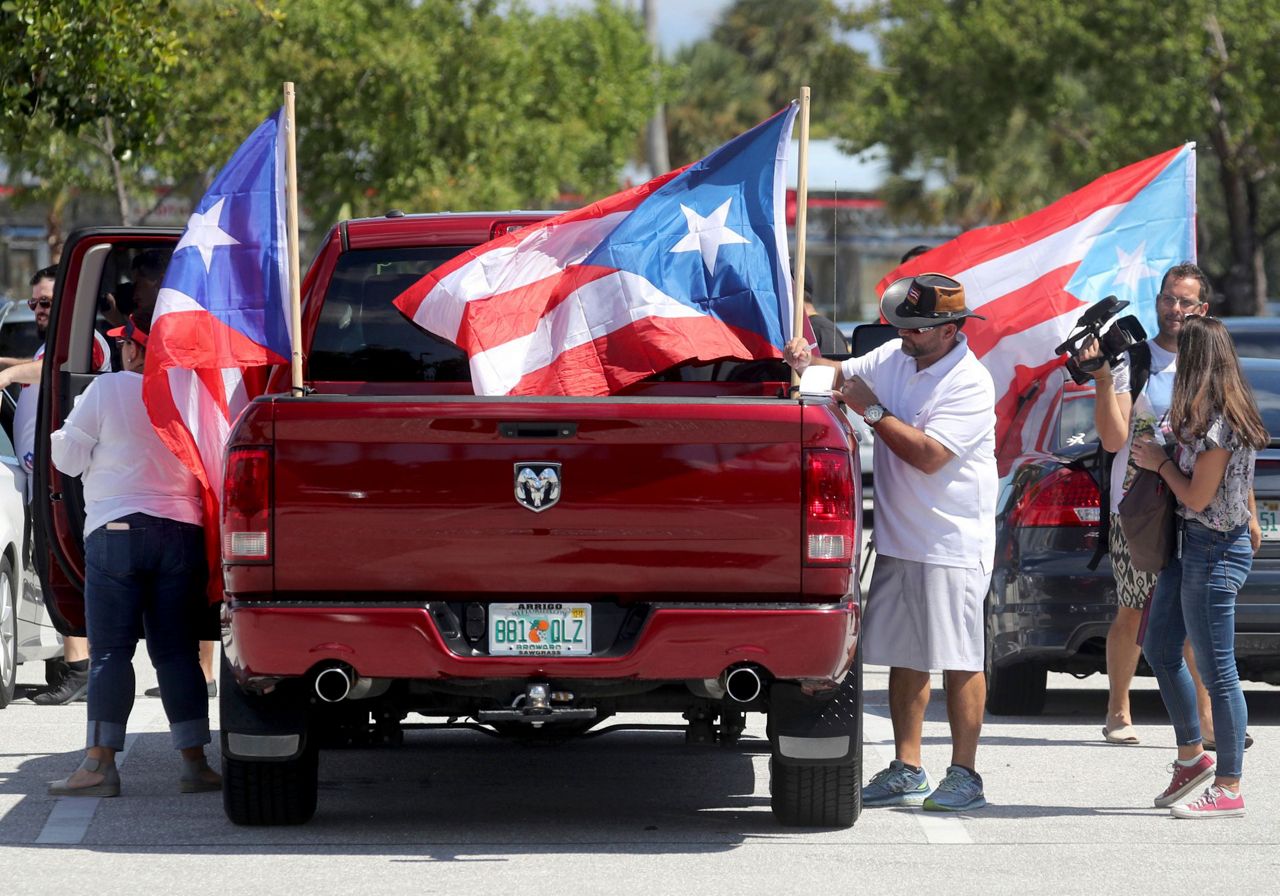 Hurricane Maria caravan, rally focuses on Trump's Mar-a-Lago