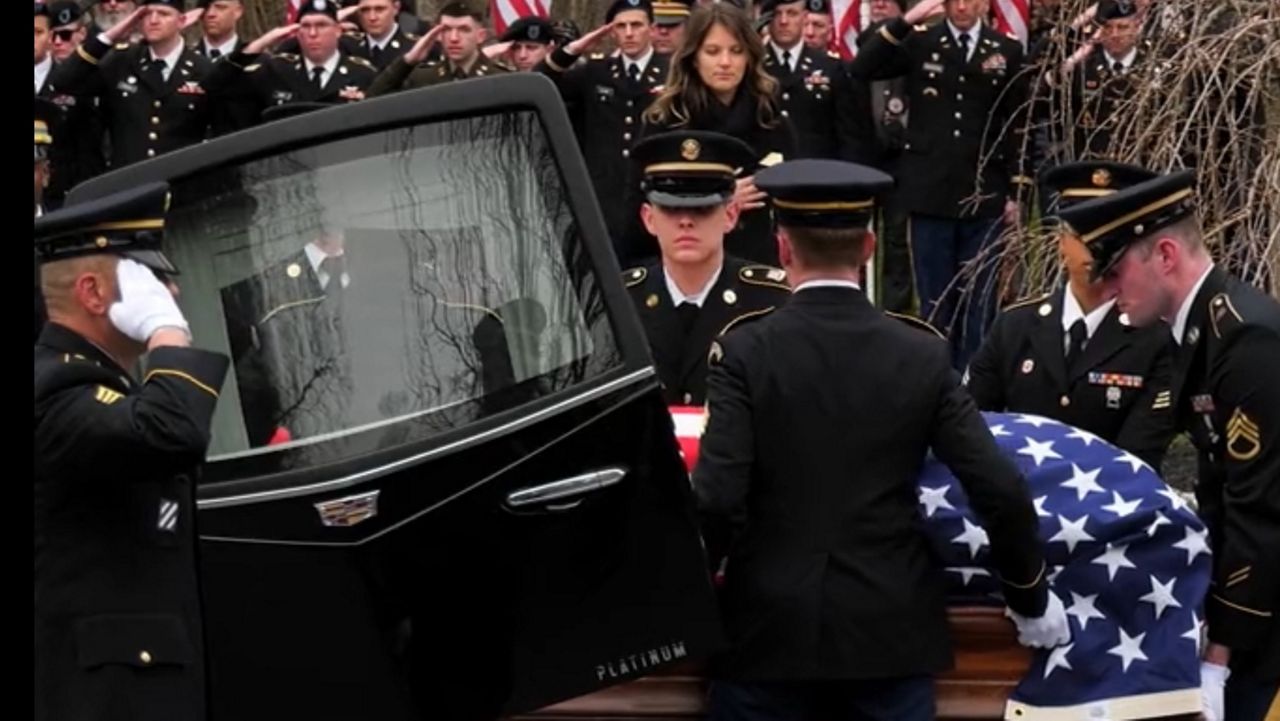 Family, friends, service members say goodbye to aviator