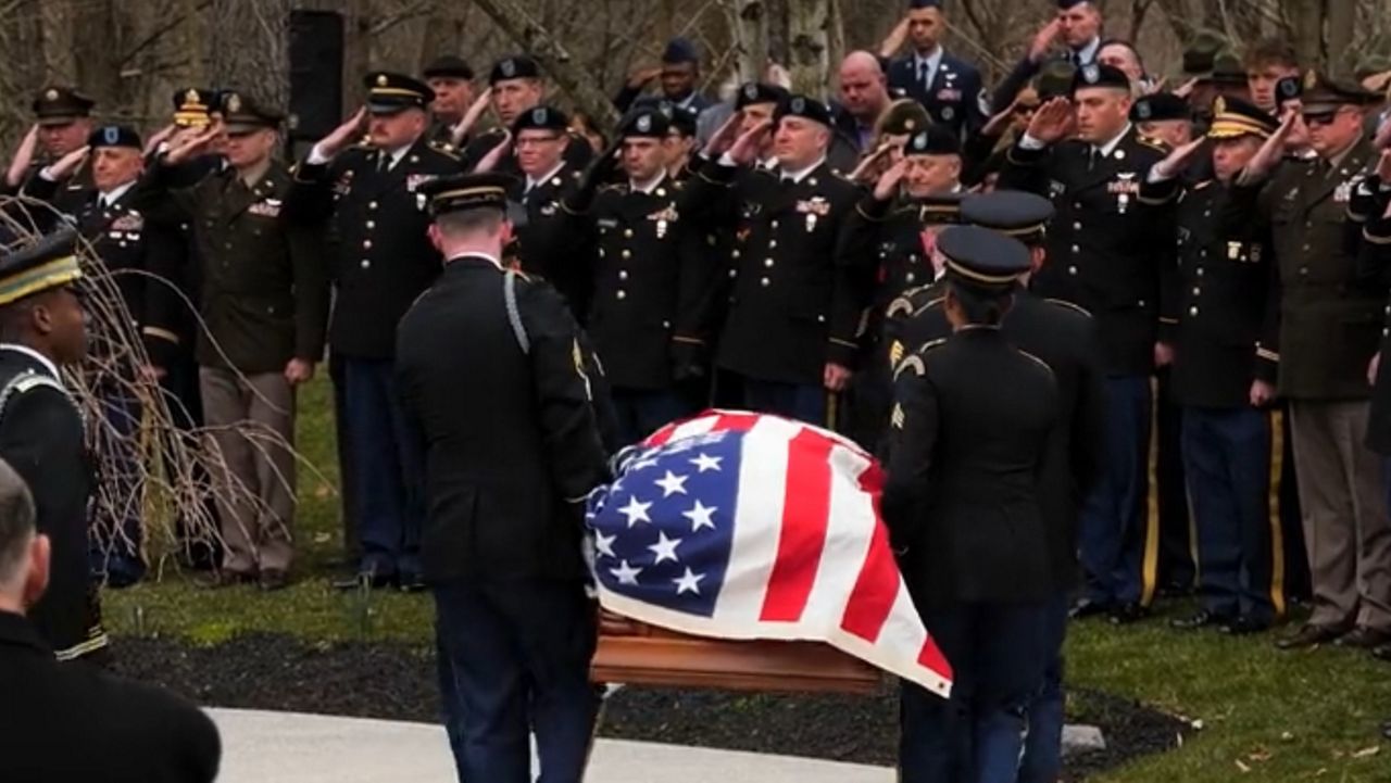 Family, friends, service members say goodbye to aviator