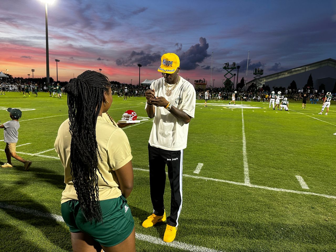USF football alums suit up, share wise words at spring game