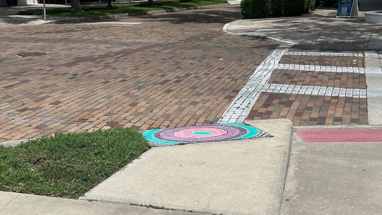 FDOT paints over storm drain murals in Orlando