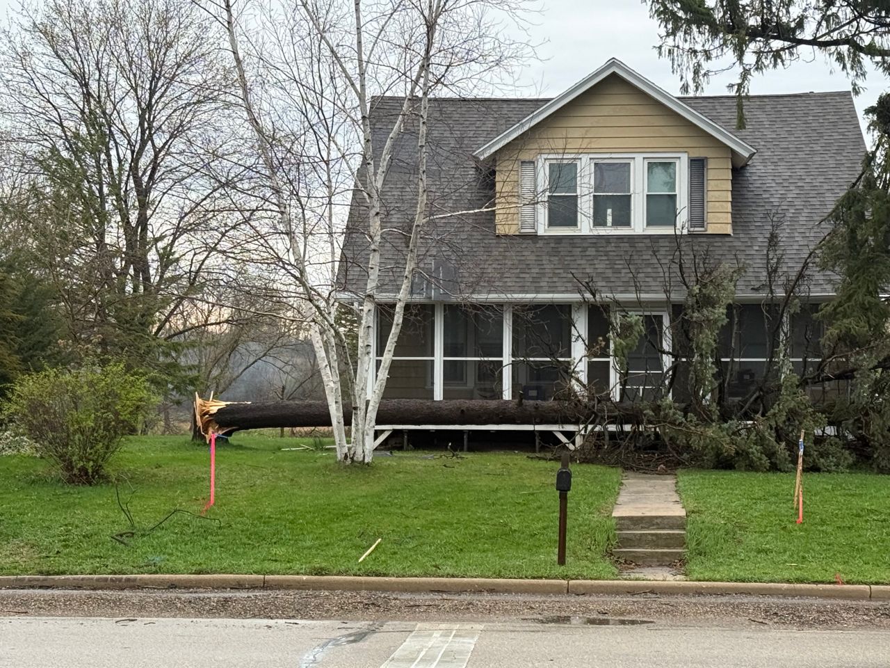 Photos: Tuesday's strong storms produce damage, flooding