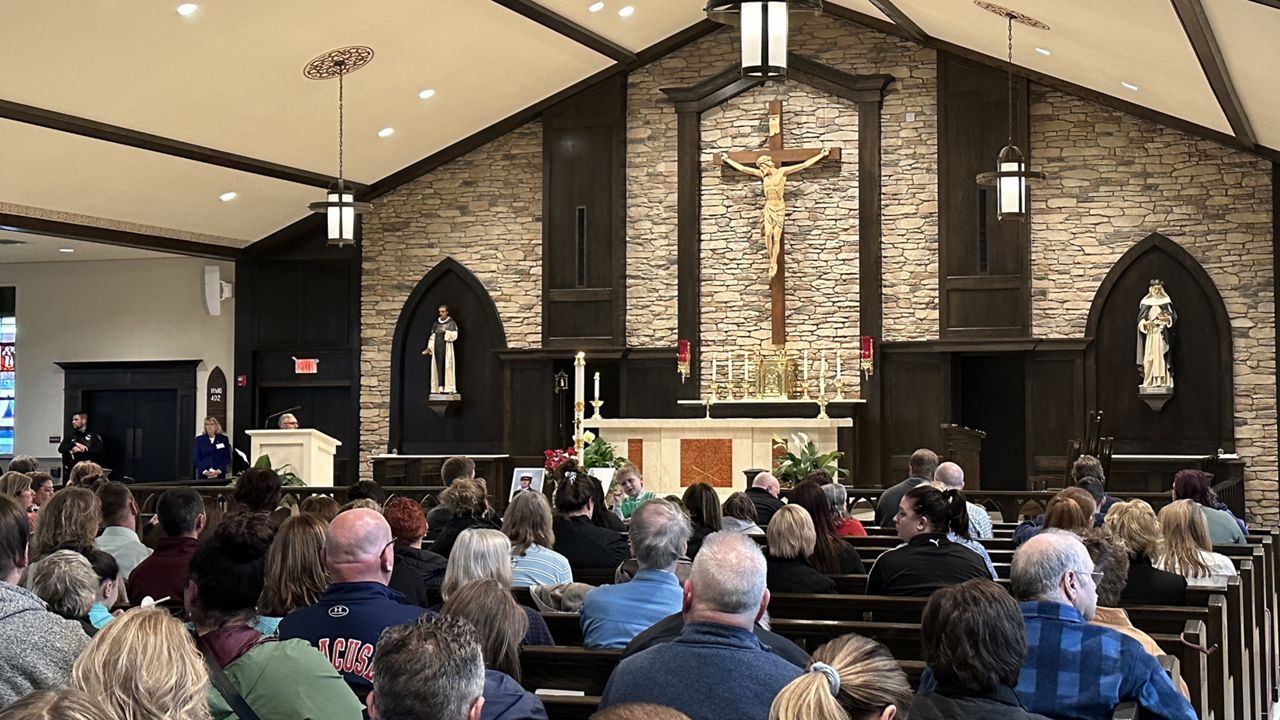 Church vigil held to honor memory of Lt. Michael Hoosock
