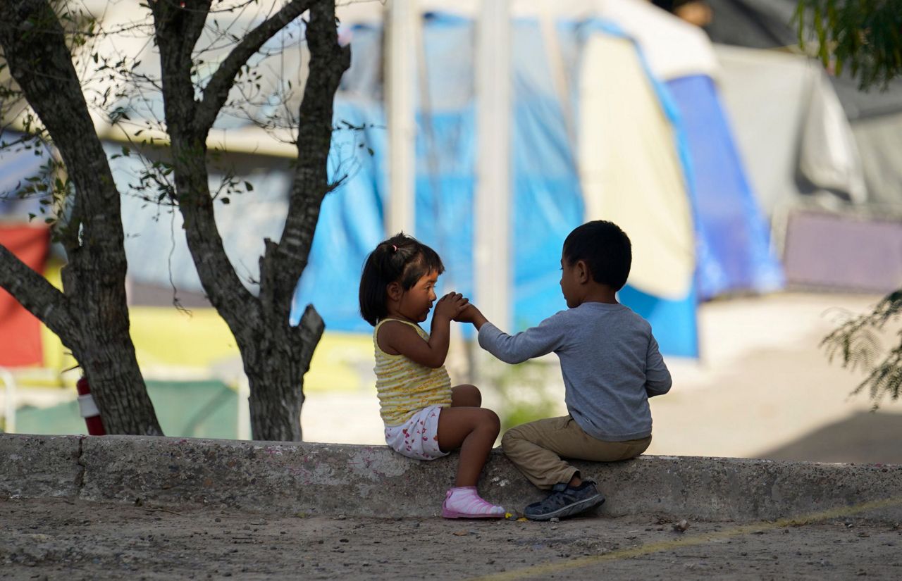 Birth on a riverbank: Woman's ordeal shows risks at border