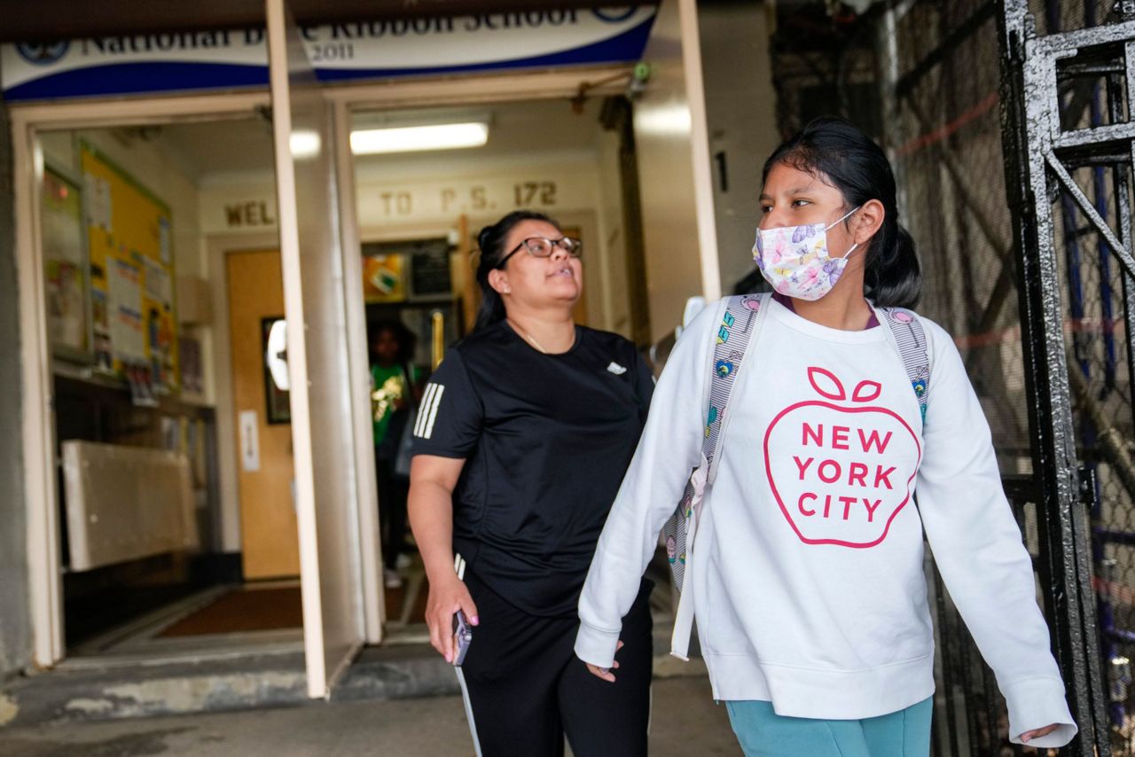 New York City turns to school gyms to house new migrants, prompting uproar