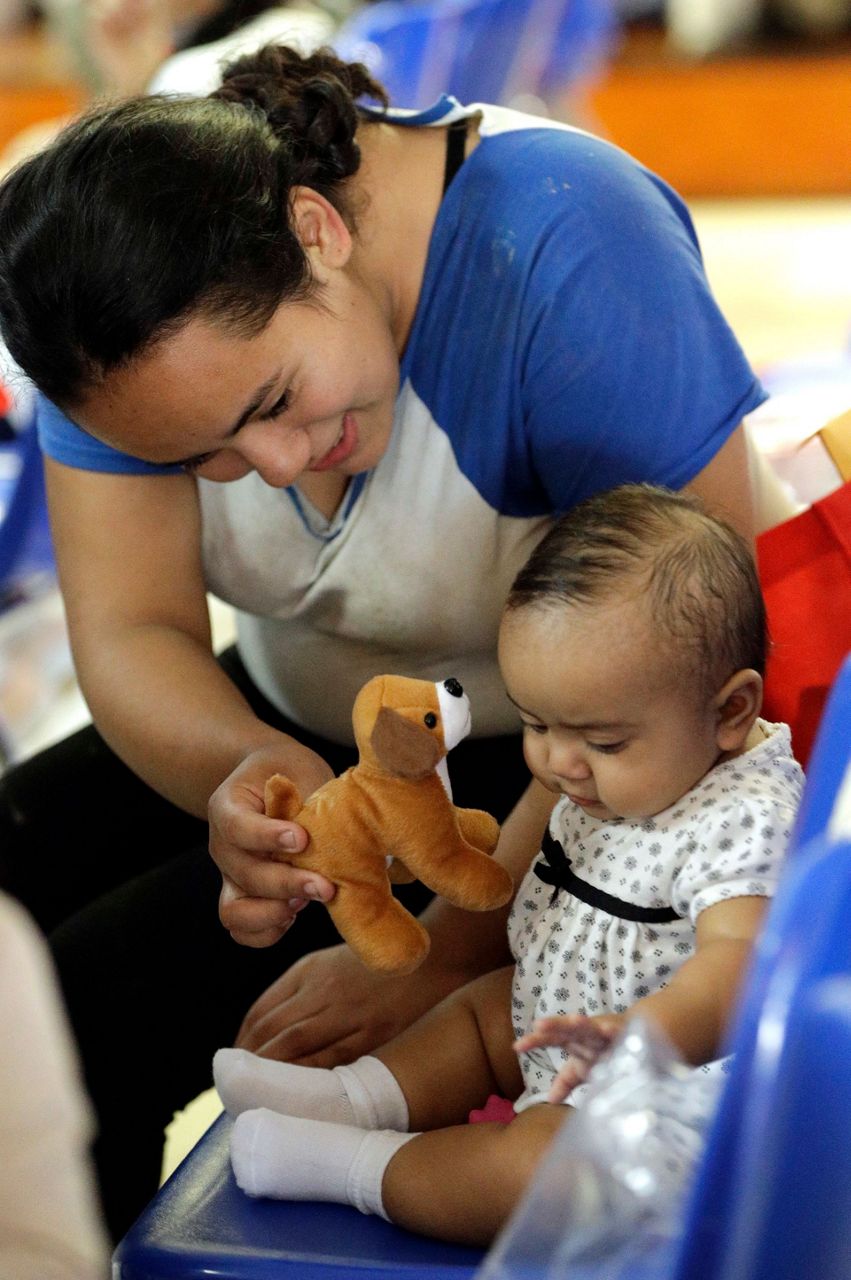At hub for border crossings, families spread throughout US