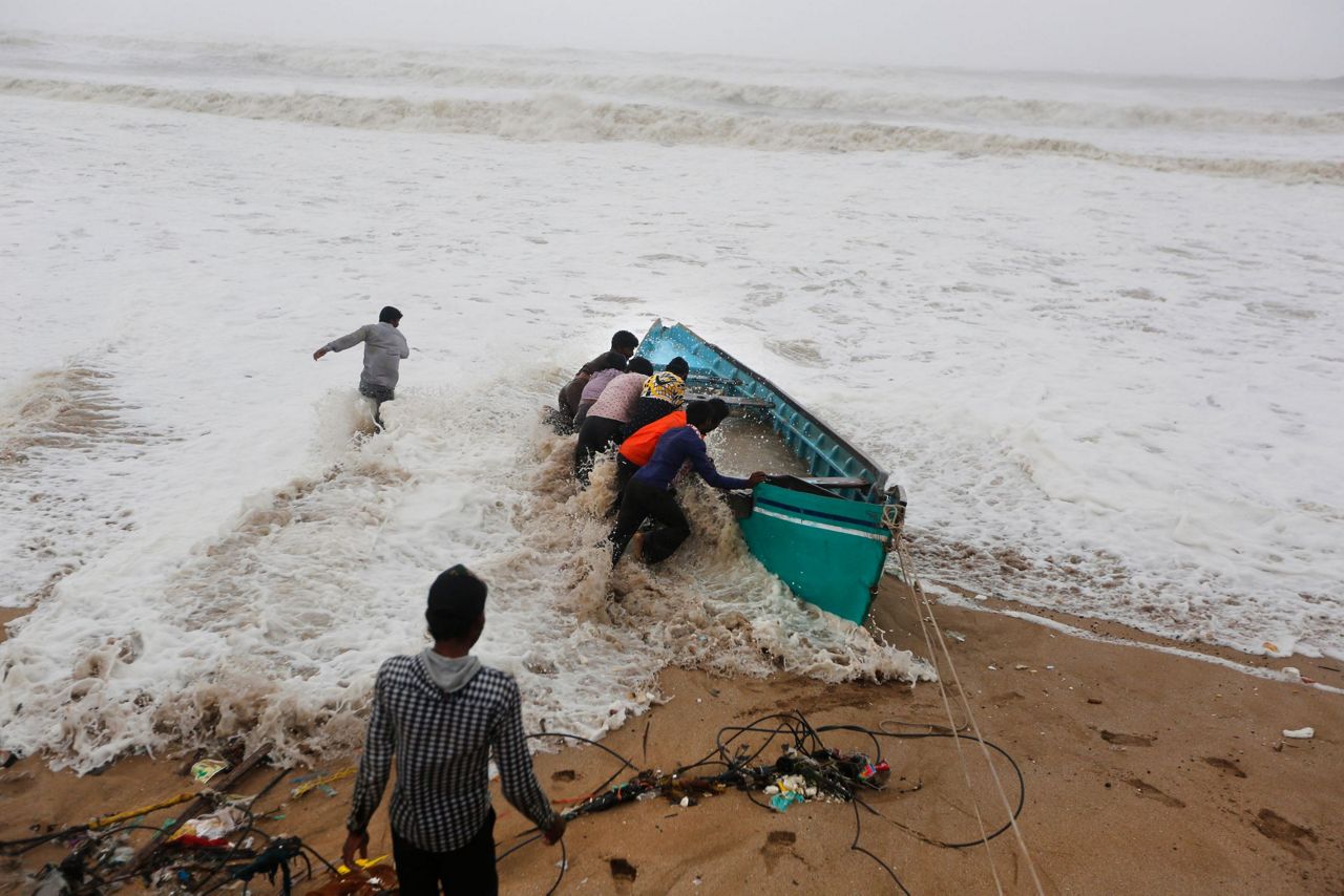 Cyclone batters fishing hub but veers away from Indian coast